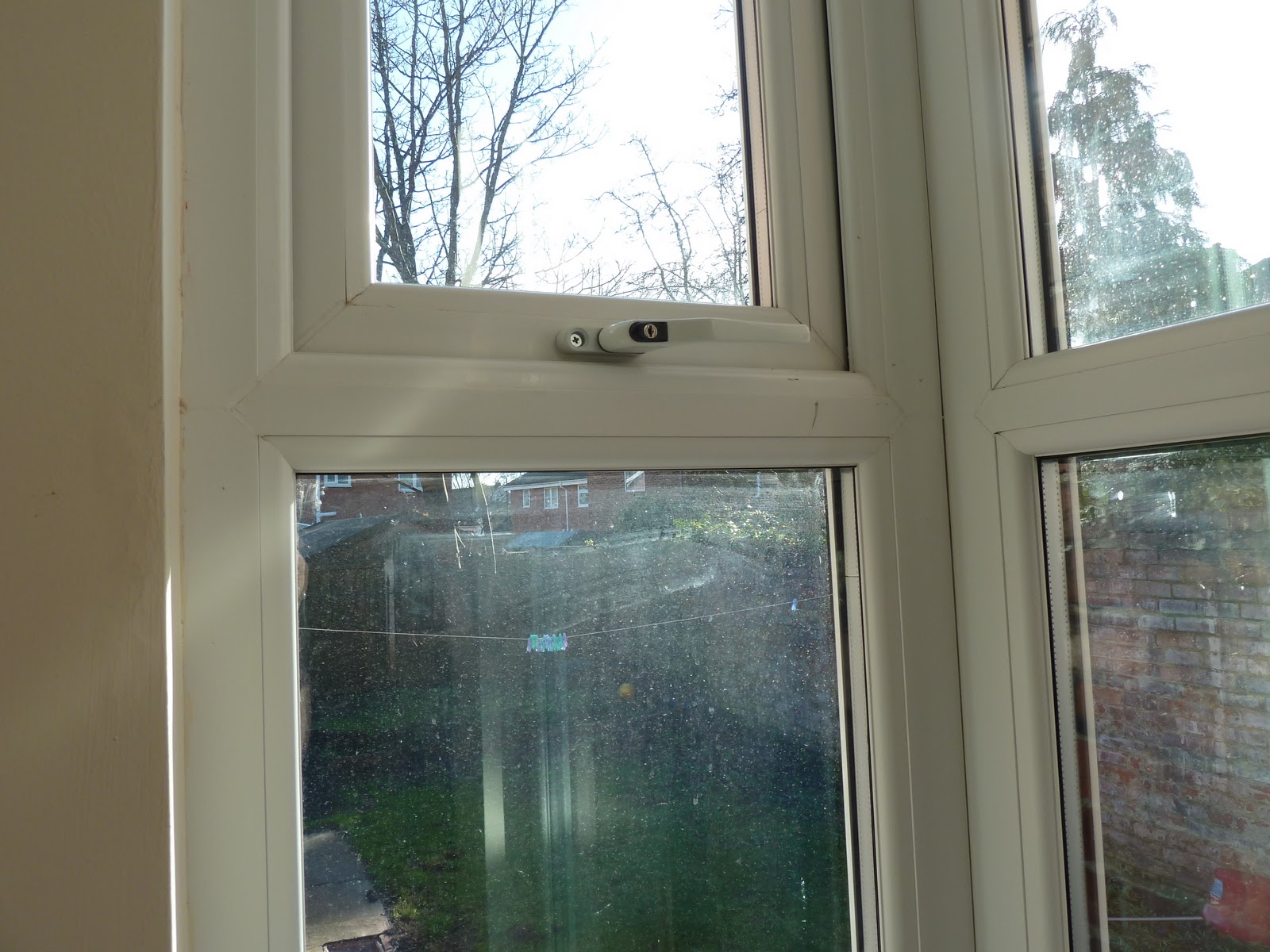 One eye in Huyton, one eye in (New) Brighton: Window locks.